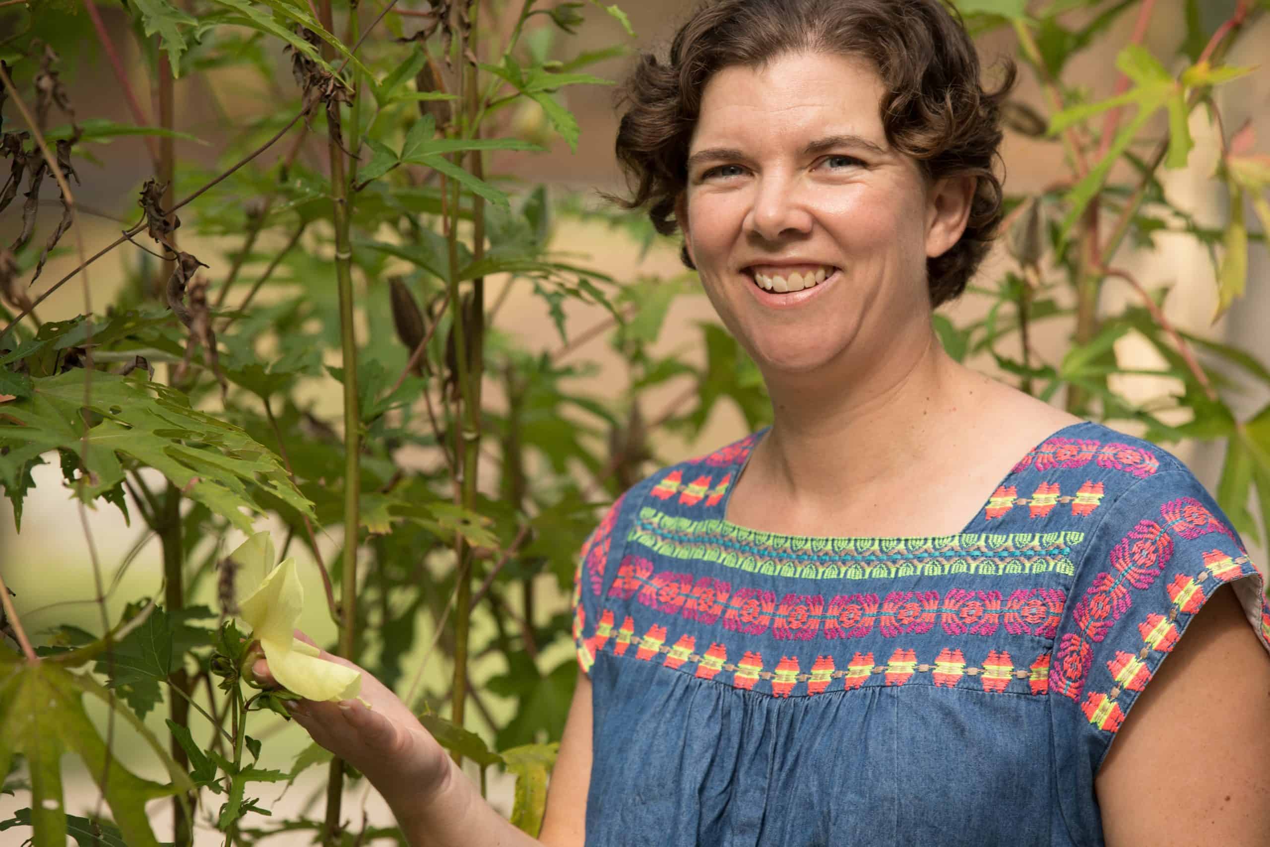 Amelia with flower | Australian Network for Plant Conservation